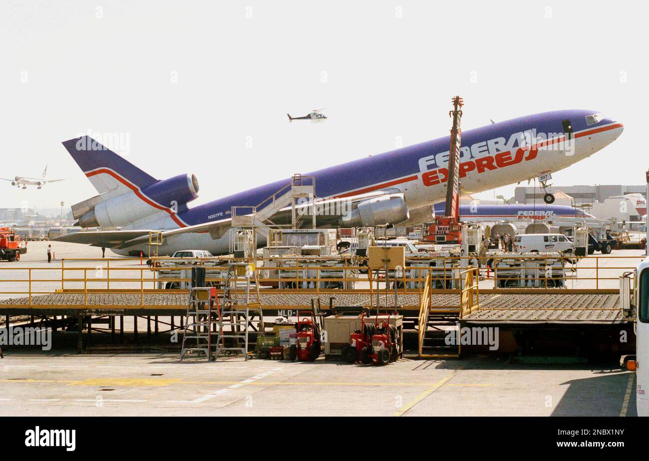 A Federal Express DC-10 cargo plane sits on the tarmac at Los Angeles ...