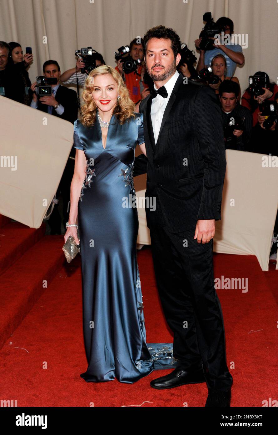 Singer Madonna and her manager Guy Oseary arrive at the Metropolitan ...