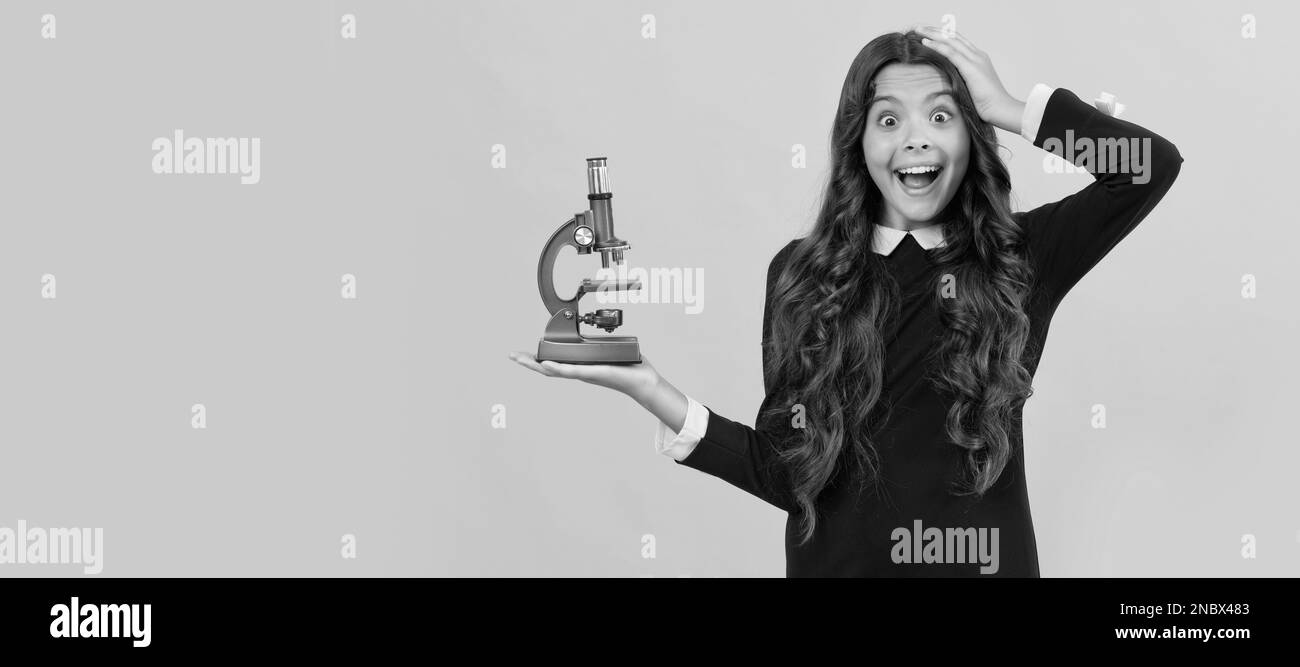 amazed scientist kid with modern scope. harness scientific method ...