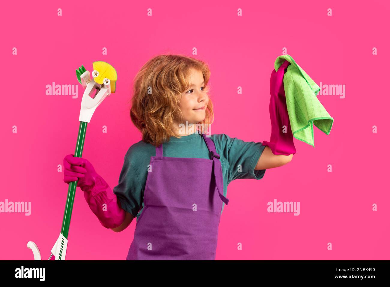 Child mopping house, cleaning home. Detergents and cleaning accessories ...