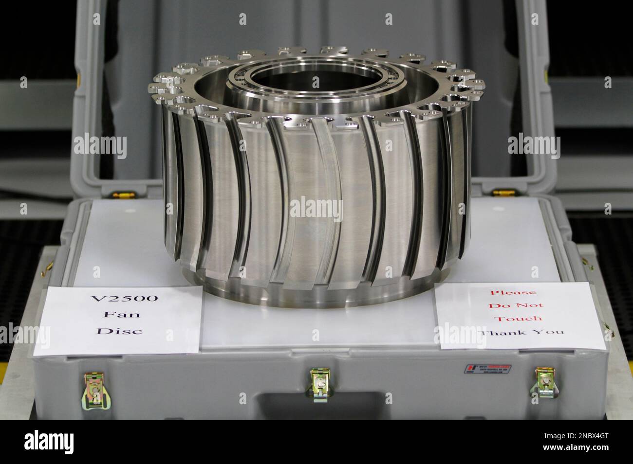 A V2500 fan disk that is to be part of a Rolls-Royce turbofan engine is ...