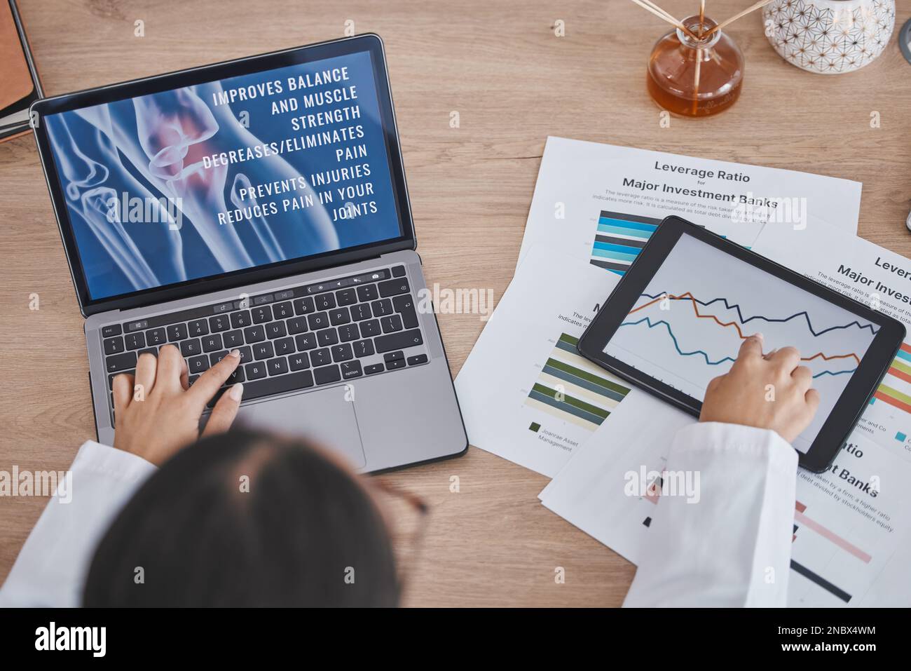 Medical, laptop data analysis or doctors hands with tablet, report or ...