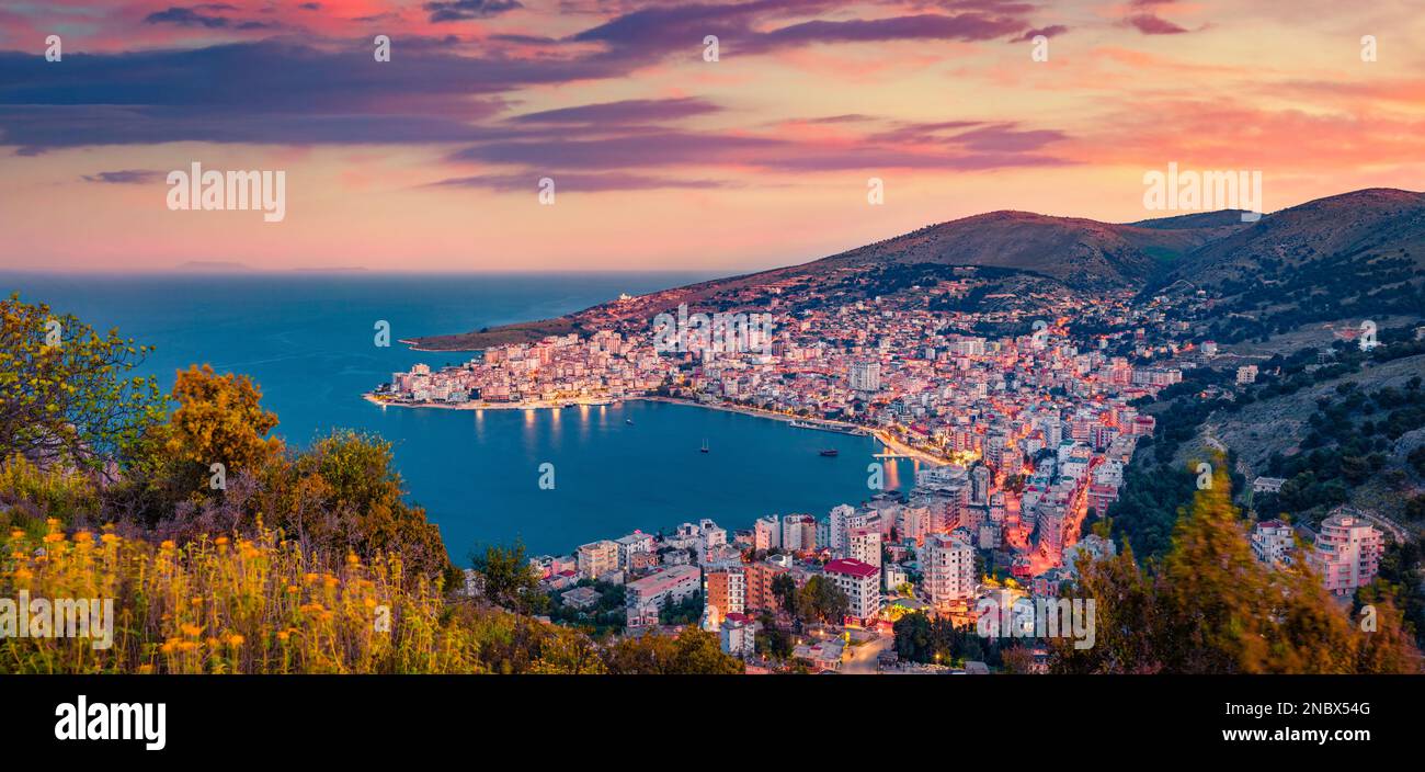 Panoramic morning cityscape of Saranda port. Great sunrise on Ionian ...