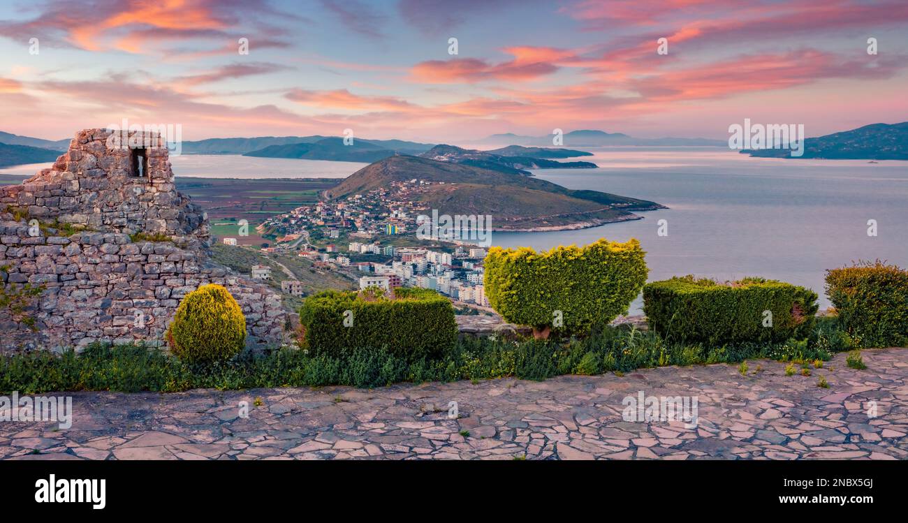 Aerial morning cityscape of Saranda port. Picturesque sunrise on ...