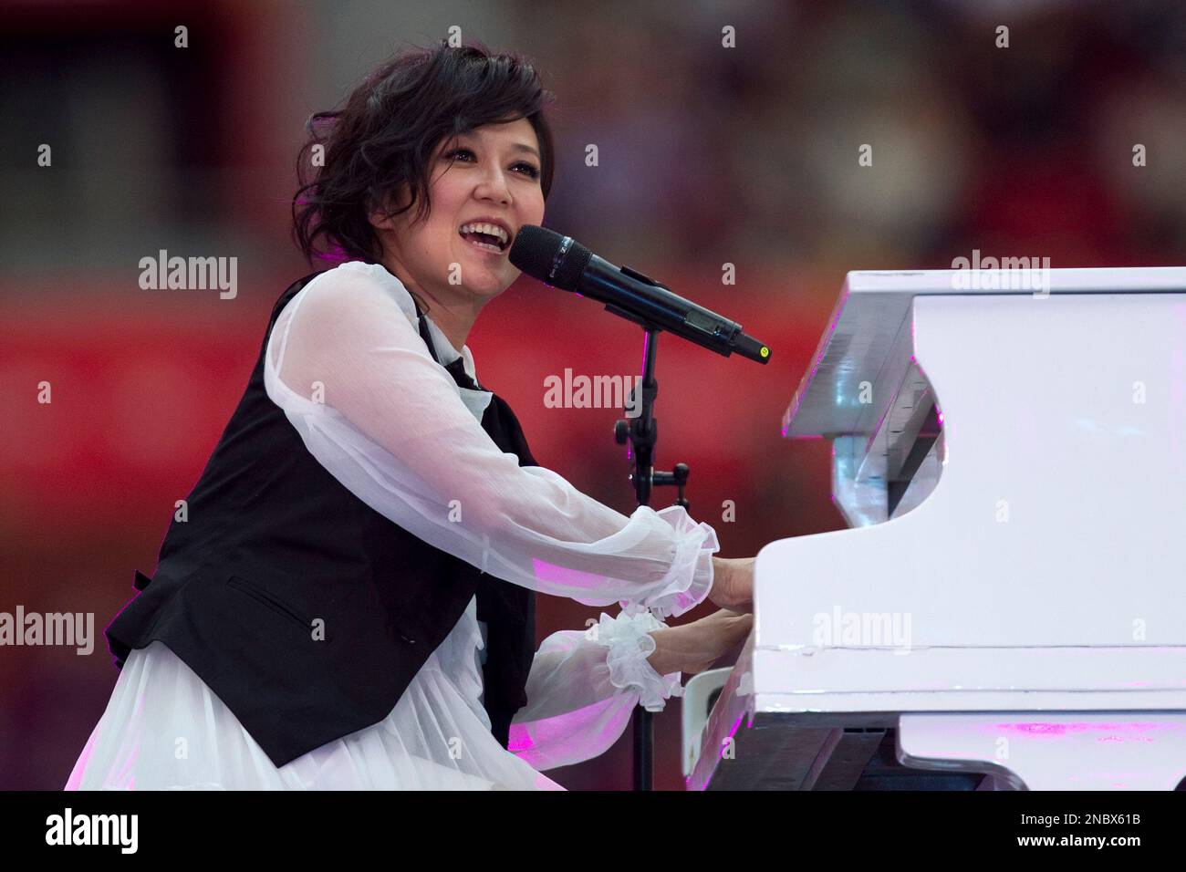 Taiwanese singer Kay Huang performs during Rock Records' 30th ...