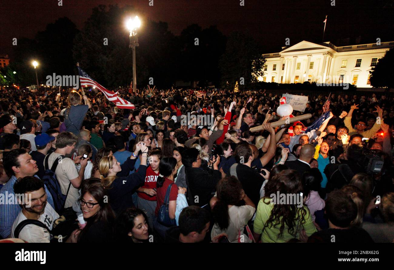 Crowds gathers outside the White House in Washington early Monday, May ...