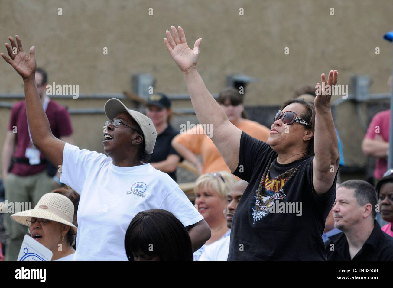 Ludie Wymbs, left, and Jean Croft worship at a service at Mt. Peria ...