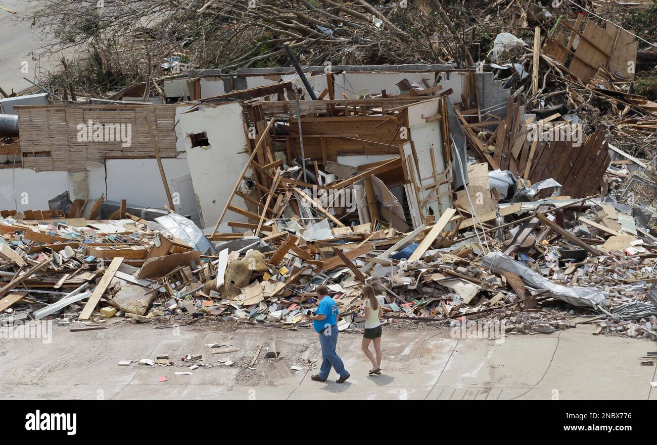 Daniel Stallings walks through his destroyed old neighborhood with his ...