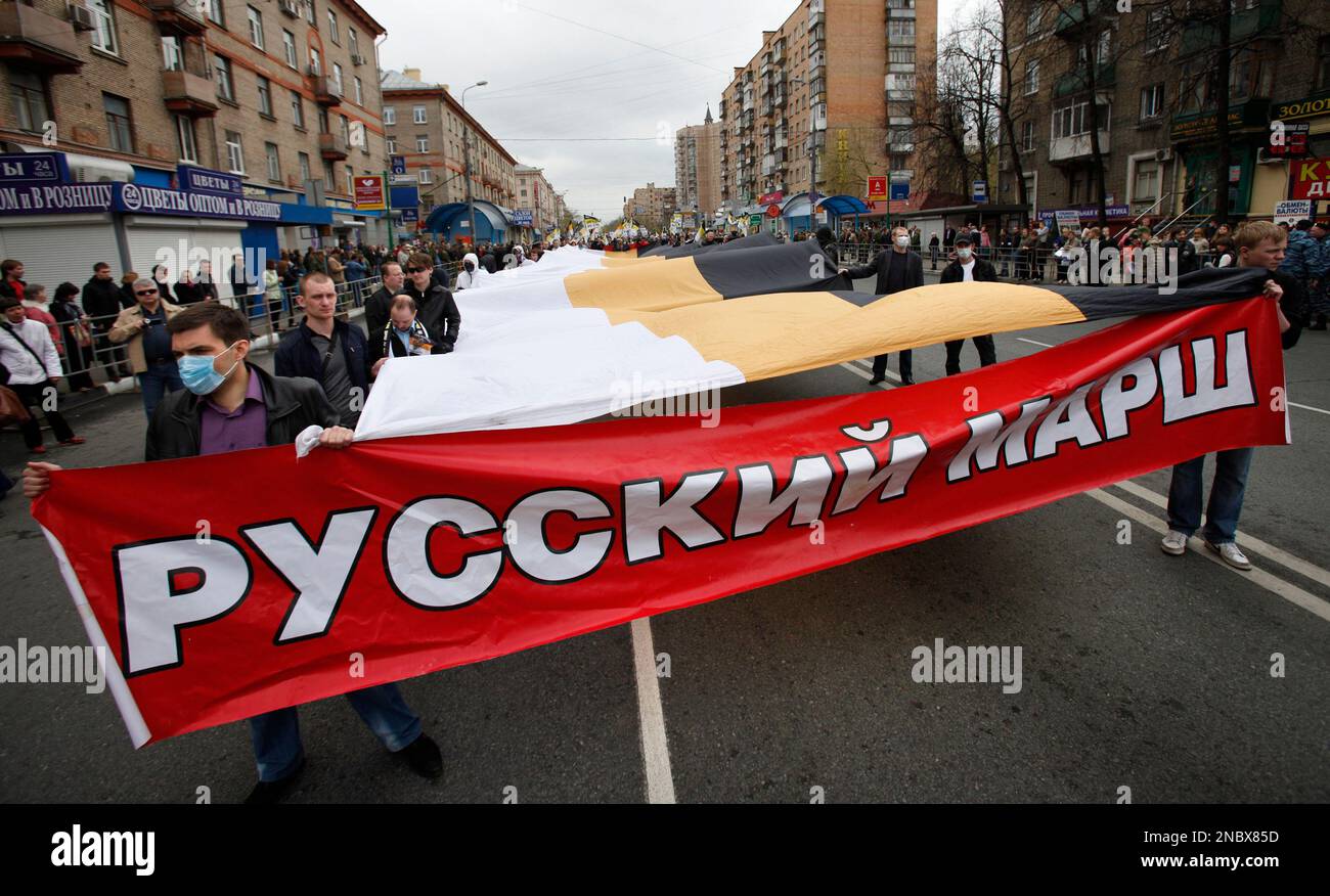 Russian nationalists, members of the Movement Against Illegal Migration ...