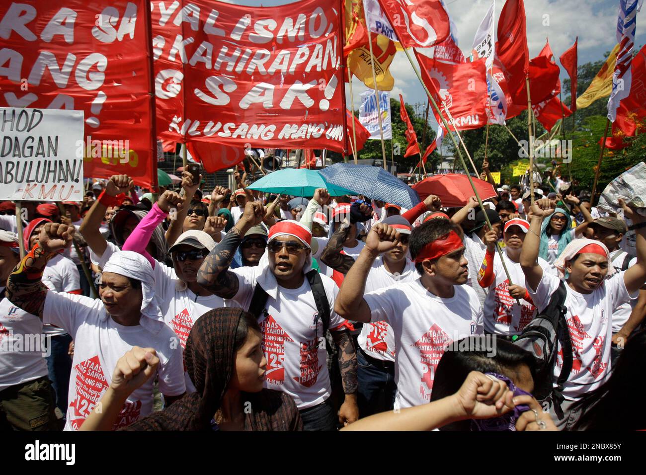 Filipino workers chant during a Labor Day rally in Manila, Philippines ...