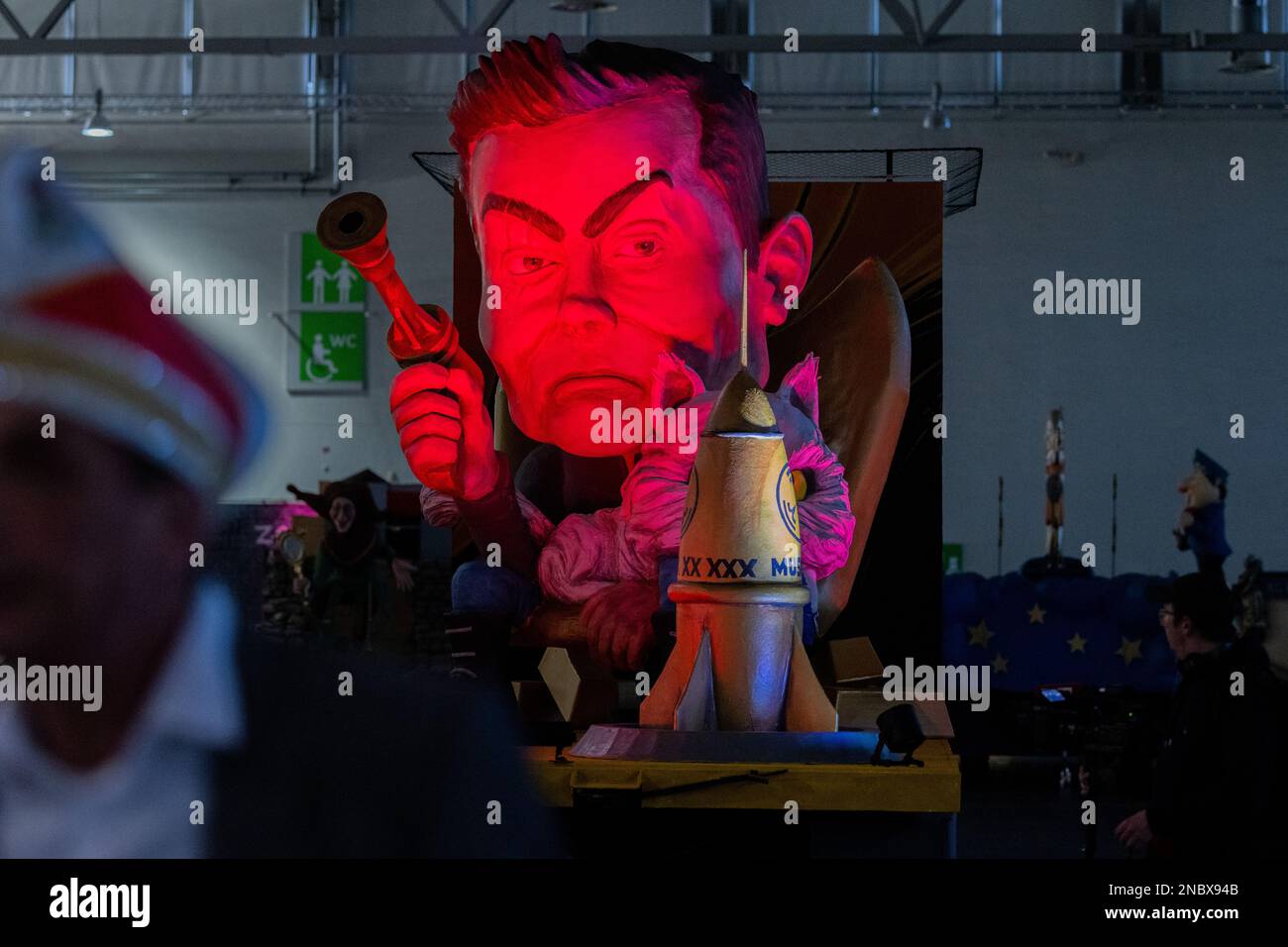 Cologne, Germany. 14th Feb, 2023. A theme float featuring Elon Musk is ...