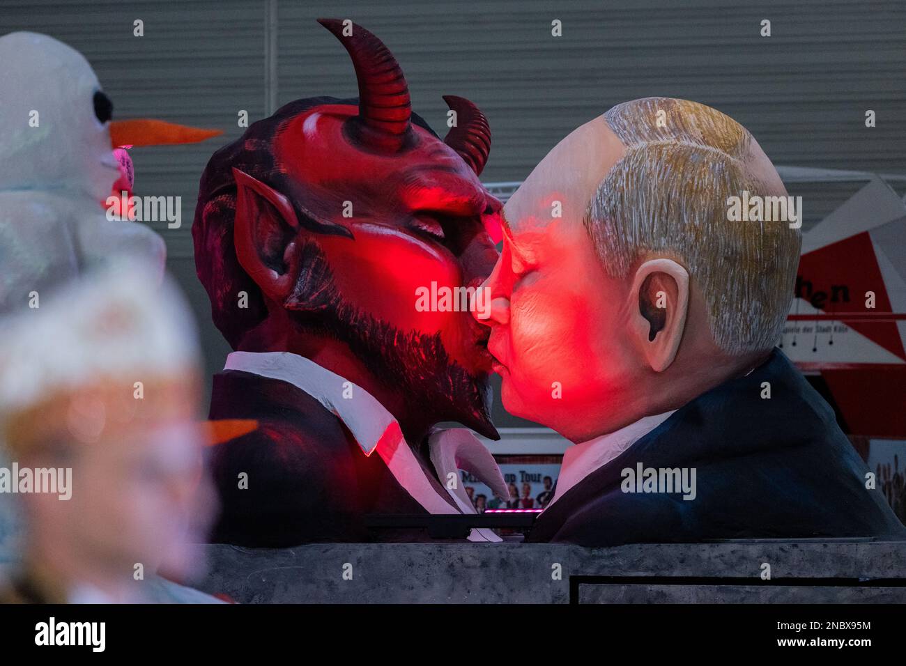 Cologne, Germany. 14th Feb, 2023. A theme float showing Russia's ...