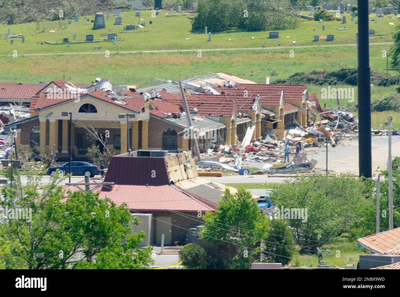 Mangled rooms at the Days Inn that was destroyed by the tornado are ...