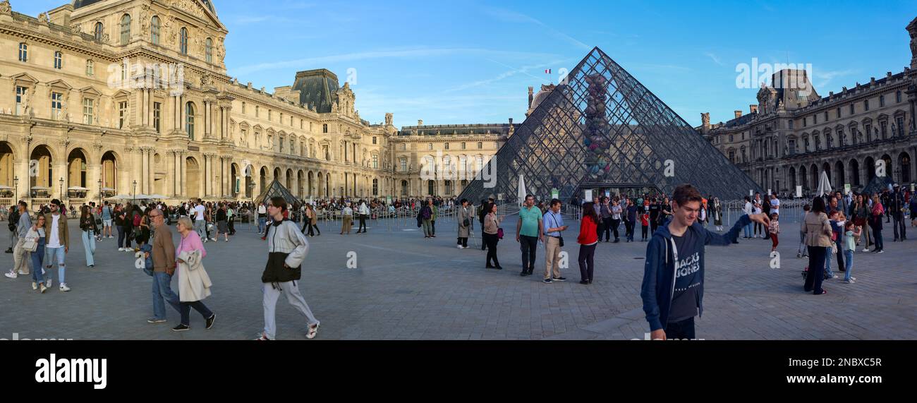 Paris, France - October 26, 2022: Louvre Museum. Tourists walk on the ...