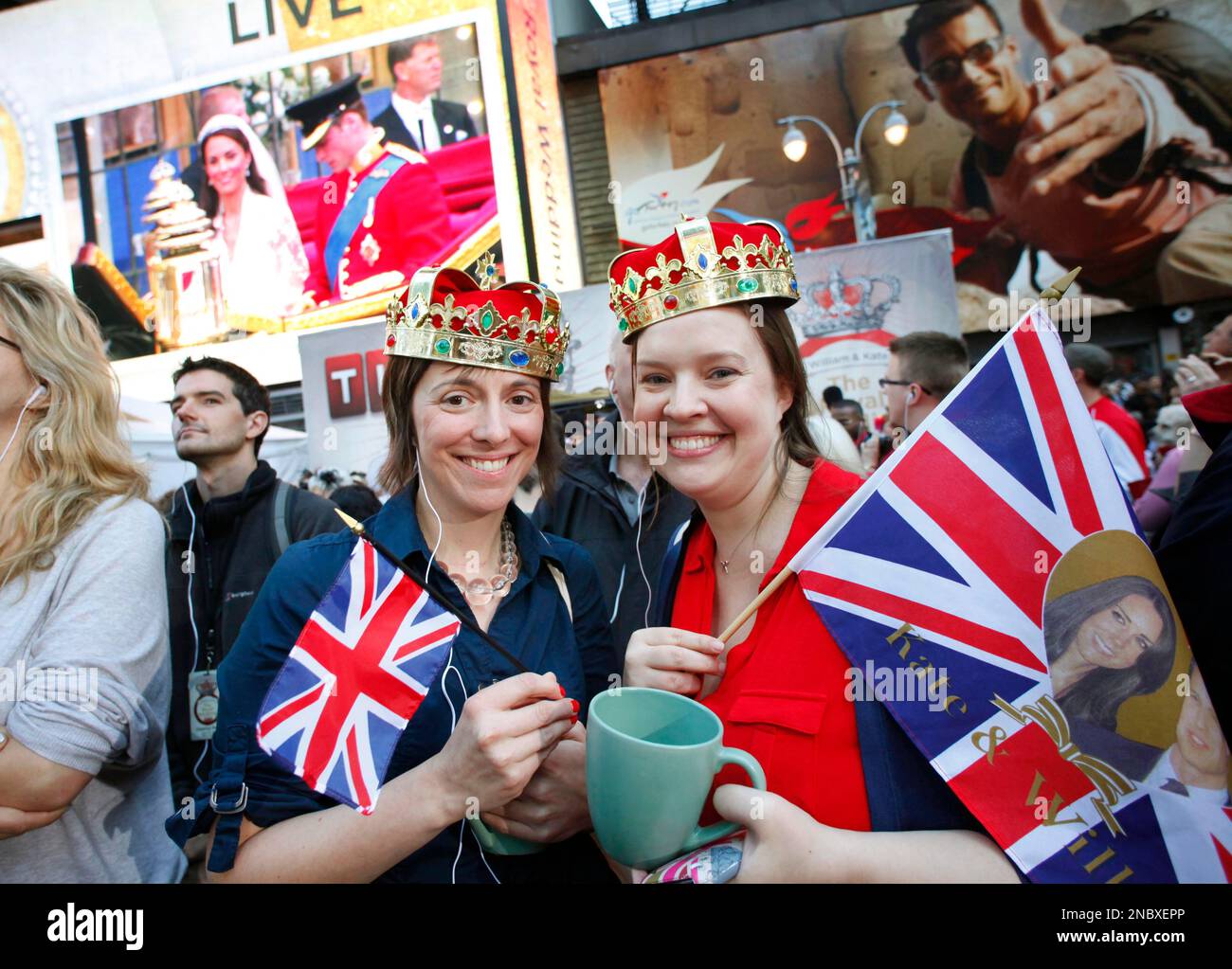 Molly Davis, left, and Amanda D'Aquila join a large crowd in New York's ...