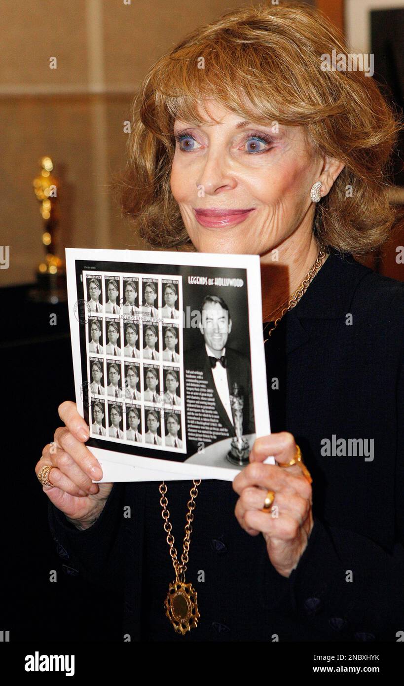 Veronique Peck, the wife of Gregory Peck shows the newly released U.S ...