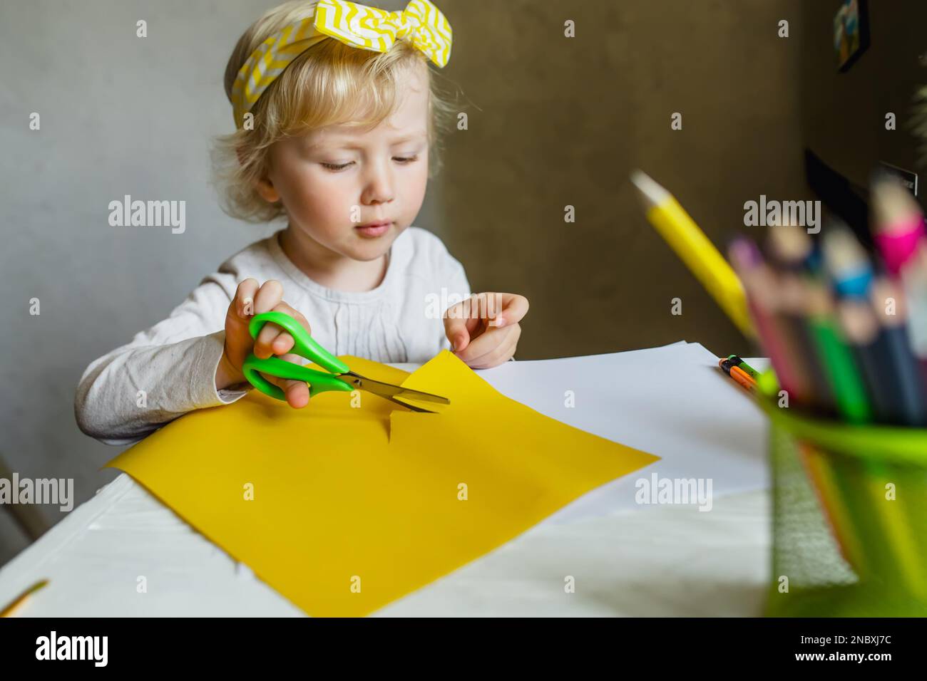 Boy cutting drawing scissors hi-res stock photography and images - Alamy