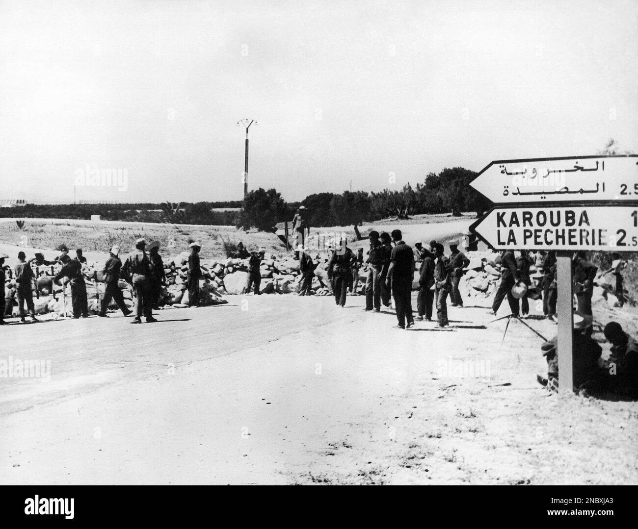 Tunisian volunteers set up roadblock on board to big French naval-air ...