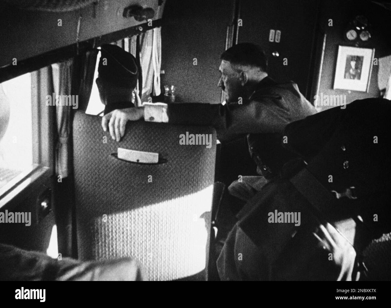 Adolf Hitler, in his special air liner flying over the battlefields of ...