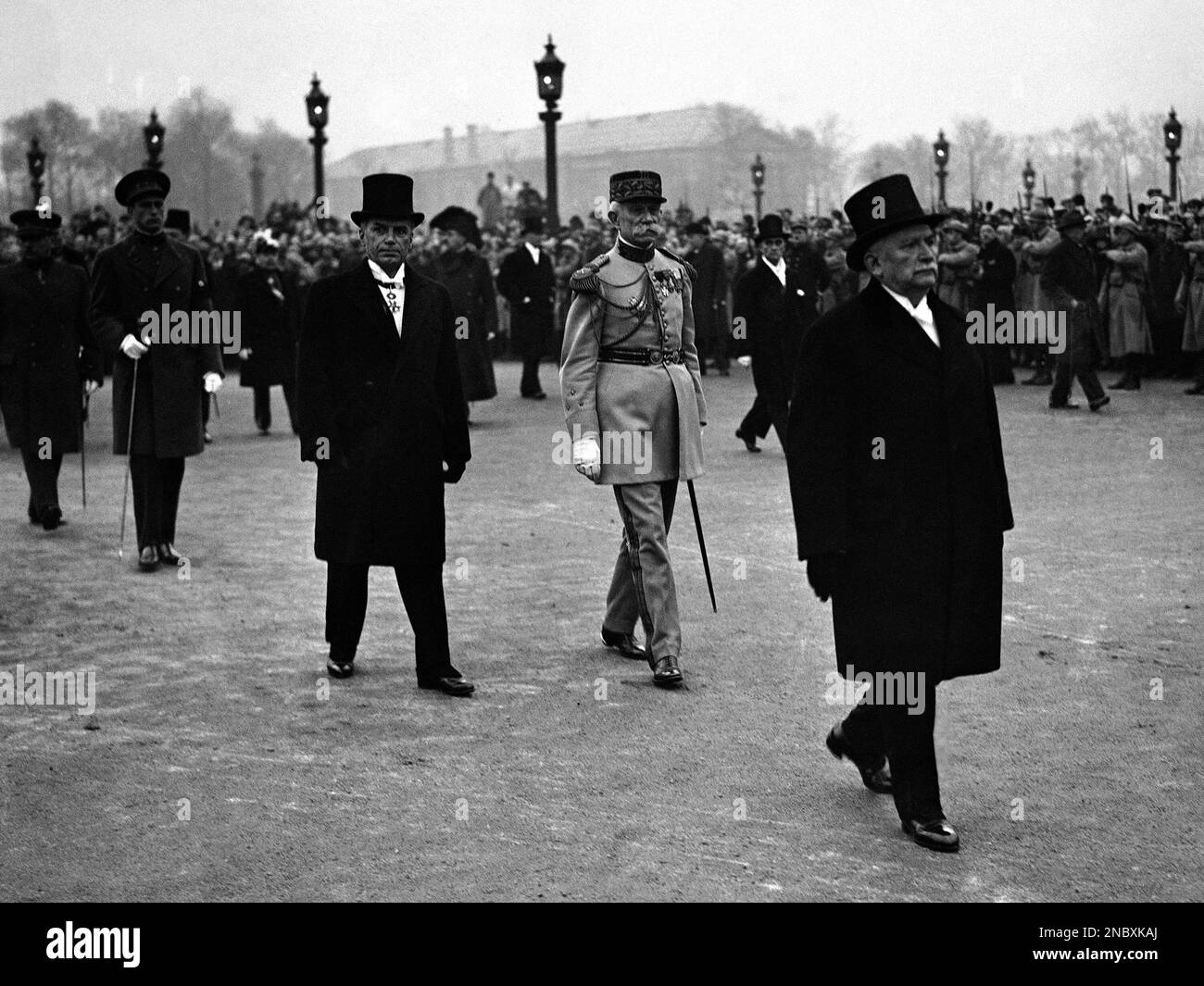 French President Gaston Doumergue leading the mourners behind the ...