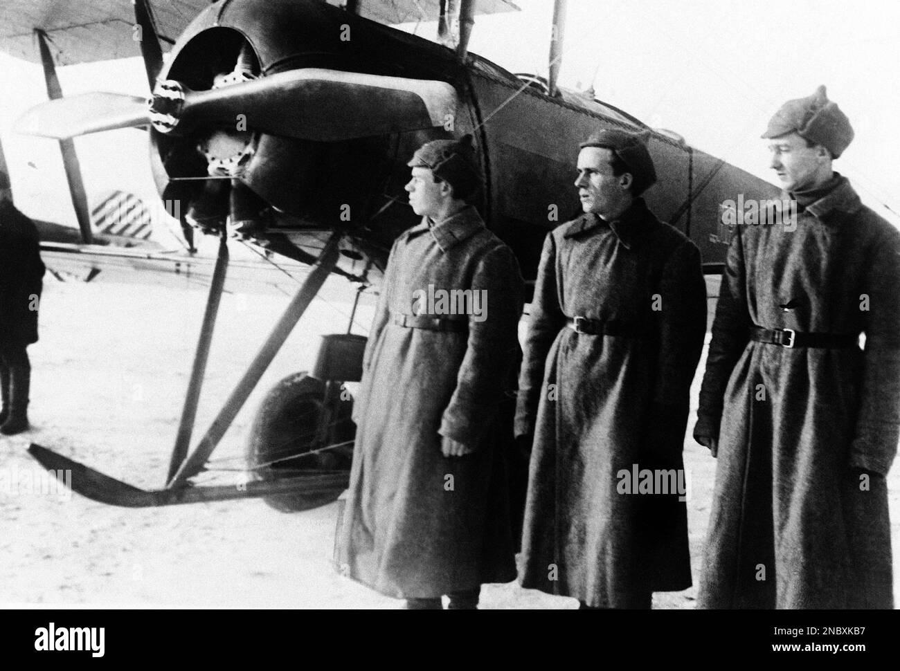 Russian pilots with one of the Soviet Air Force planes around Jan. 9 ...