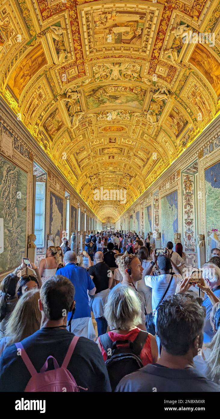 A group of tourists wandering around at the Vatican Museum Stock Photo ...