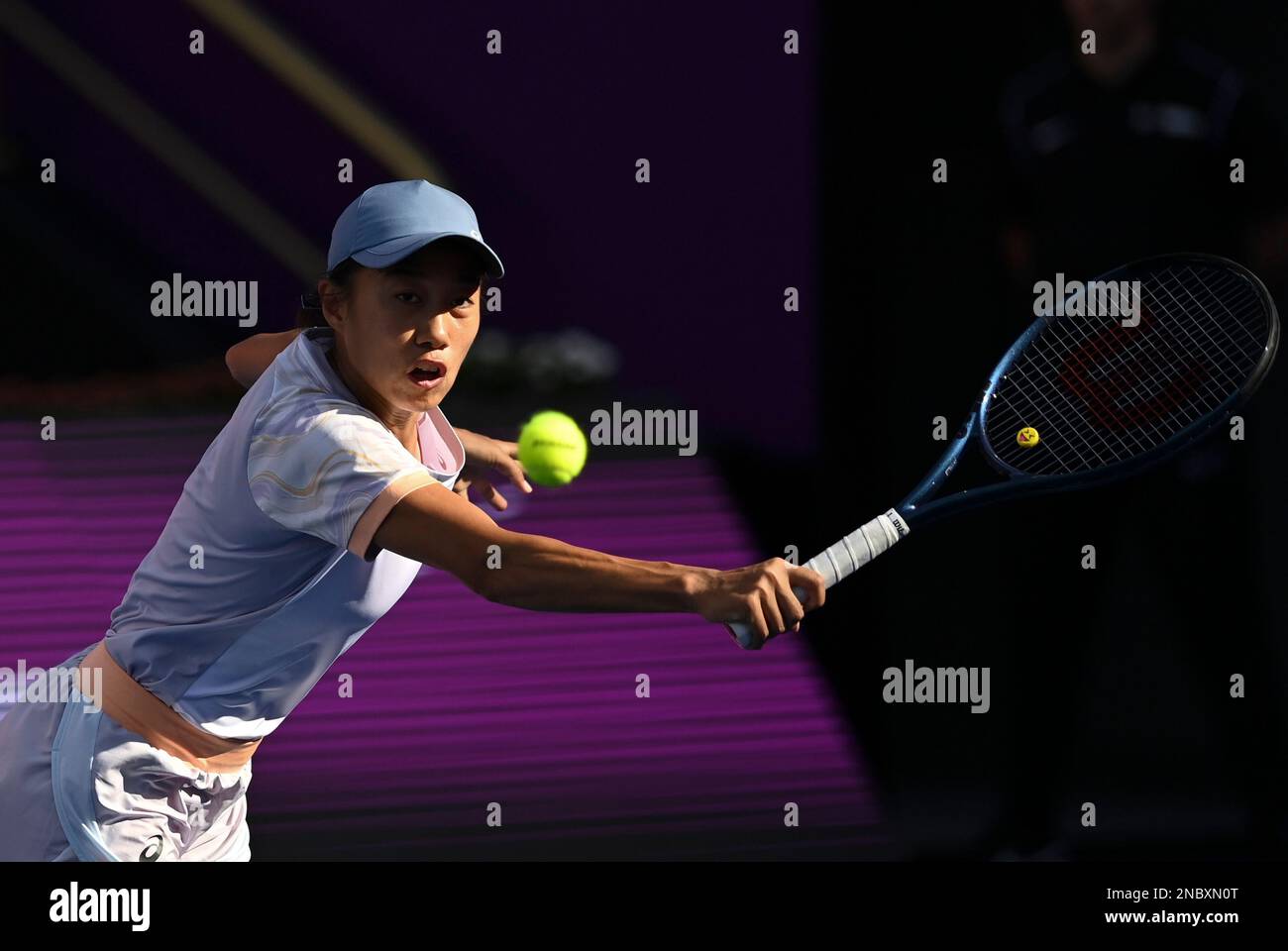 Doha, Qatar. 14th Feb, 2023. Zhang Shuai competes during the singles ...