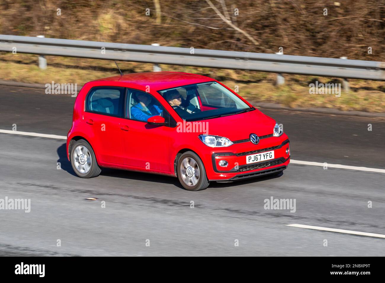 2017 Red VW Volkswagen High UP TSI; travelling on the M61 motorway, UK ...