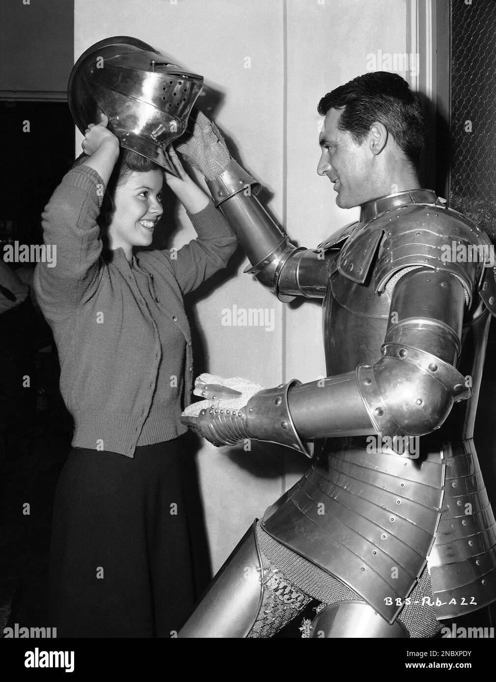 Cary Grant is dressed as a knight while shooting a scene for “The ...
