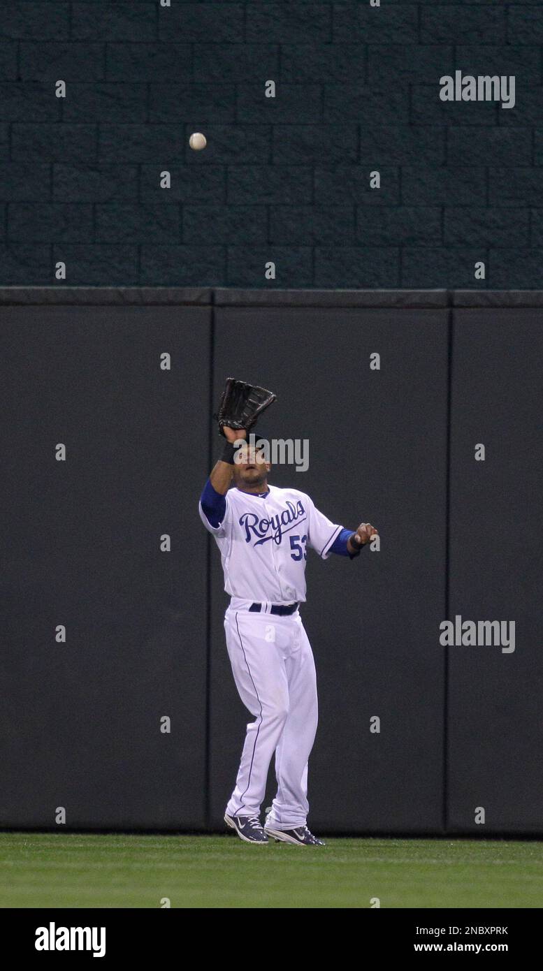 Kansas City Royals center fielder Melky Cabrera (53) catches a fly ball ...
