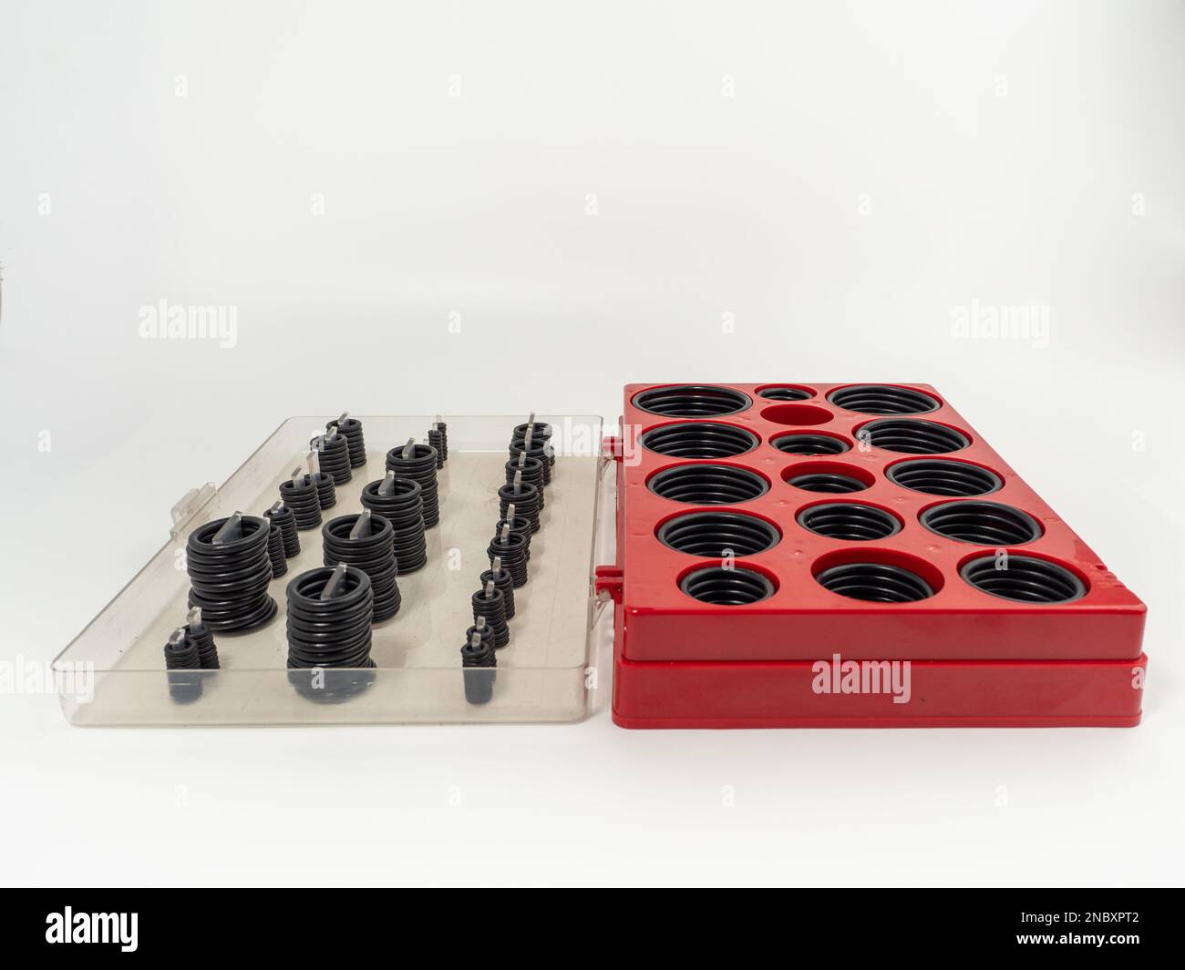 Hydraulic and pneumatic o-rings in black in different sizes on a white ...