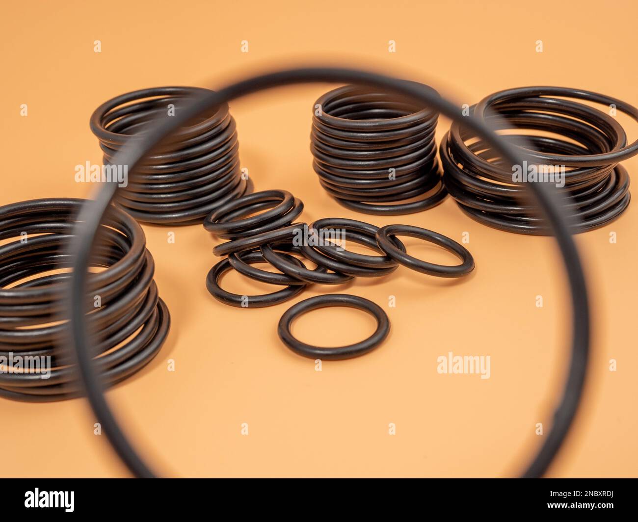 Hydraulic and pneumatic o-rings in black in different sizes on an ...