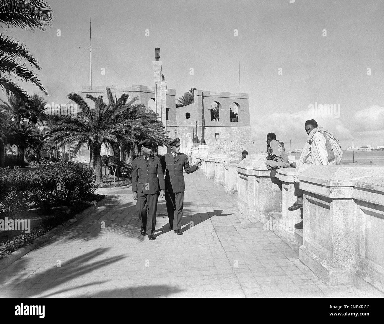 Two airmen from Wheelus Field Air Base, Pfc. Robert R. Evans, left, and ...
