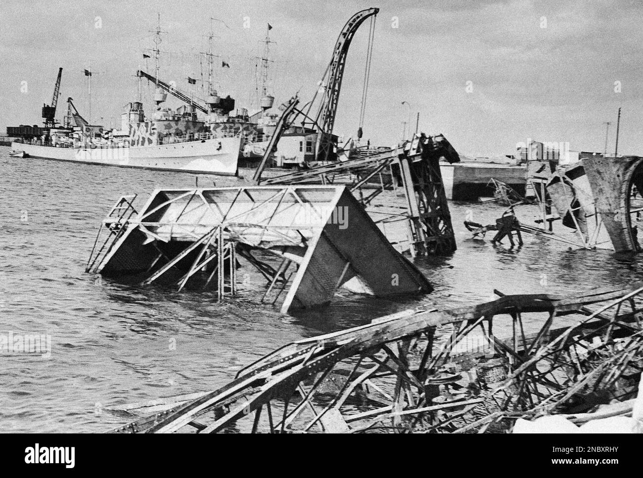 Units of the German Navy lying in readiness behind the ruins of a French port in France on Jan ...