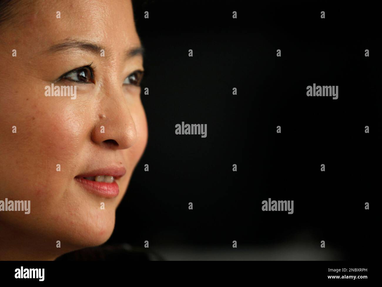 Chinese director Li Yu reacts during an interview in Hong Kong ...
