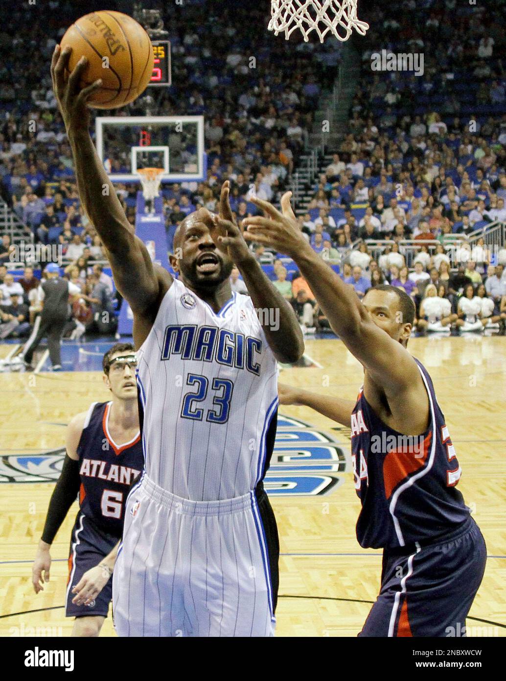 Orlando Magic's Jason Richardson (23) goes in for a lay up past Atlanta ...