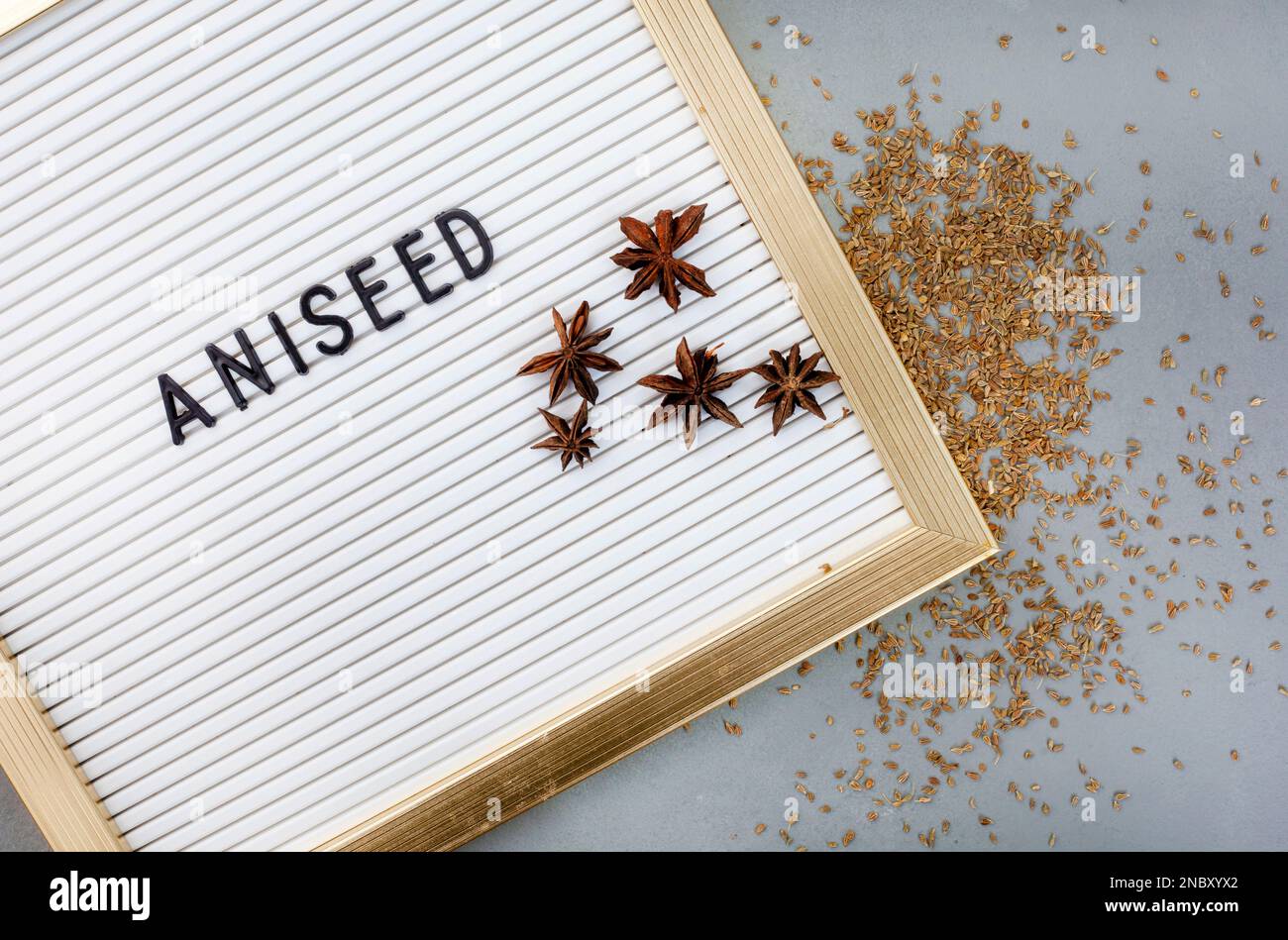Aniseed with pods with letter board reading aniseed Stock Photo - Alamy