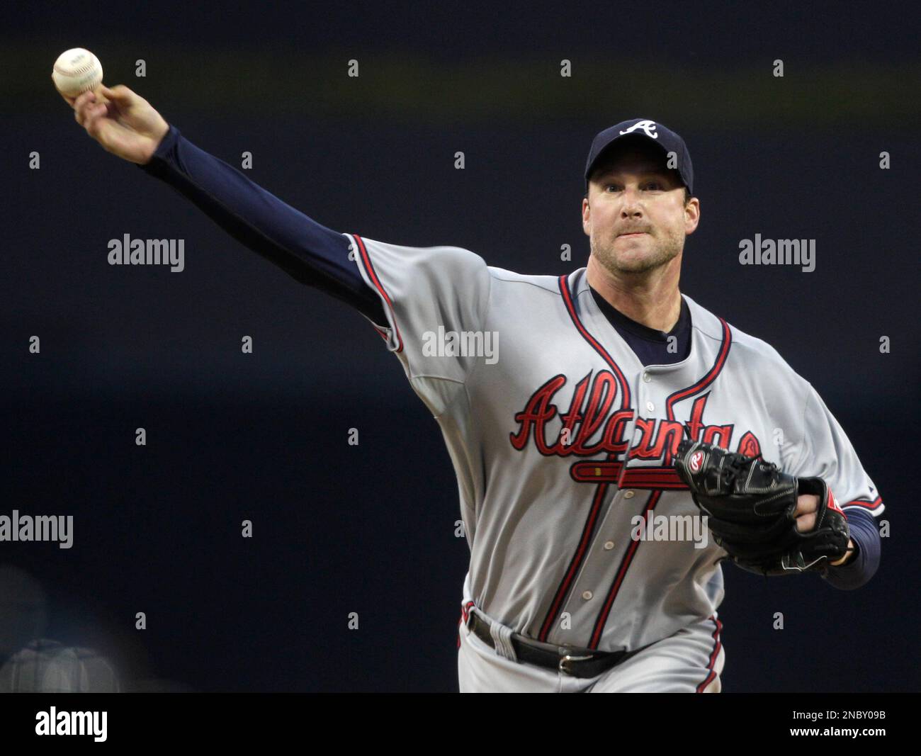 Atlanta Braves starting pitcher Derek Lowe releases a pitch against the ...