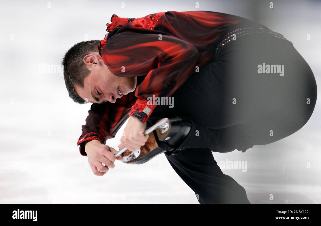 Canada's Joey Russell performs his free program during the preliminary ...