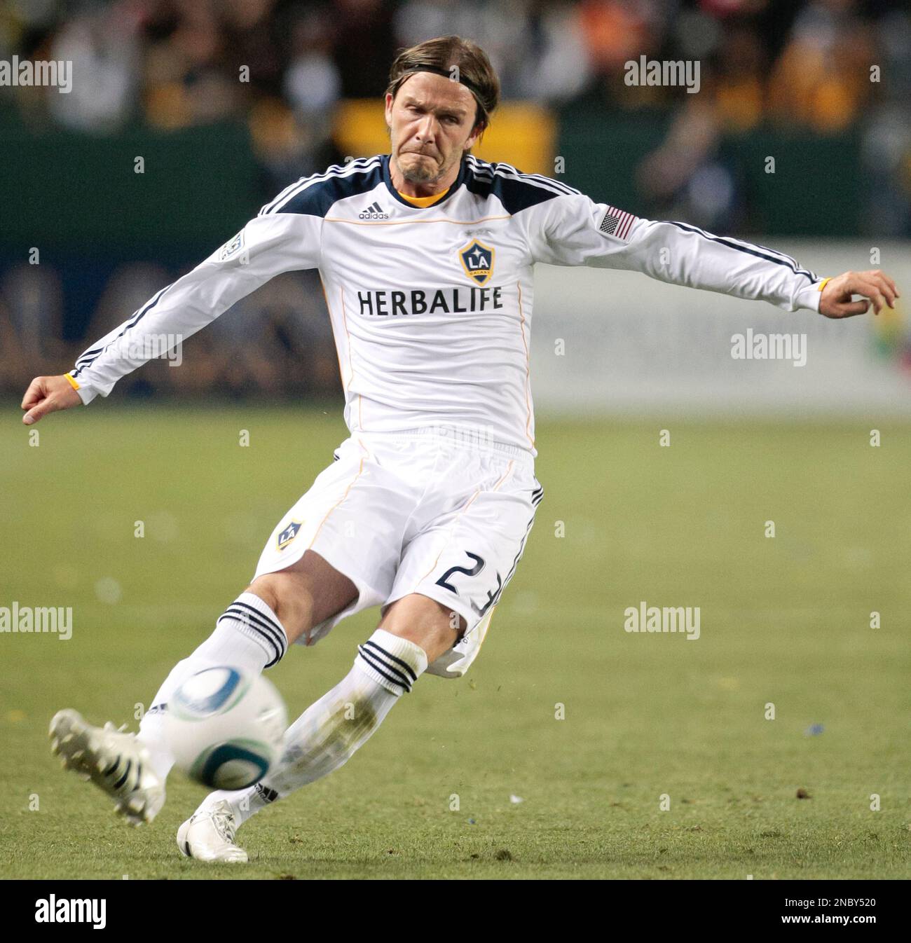 Los Angeles Galaxy midfielder David Beckham takes a shot off a free ...