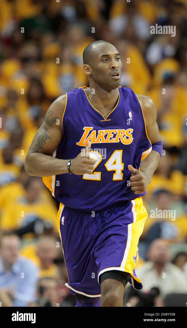 Los Angeles Lakers shooting guard Kobe Bryant (24) runs down court ...