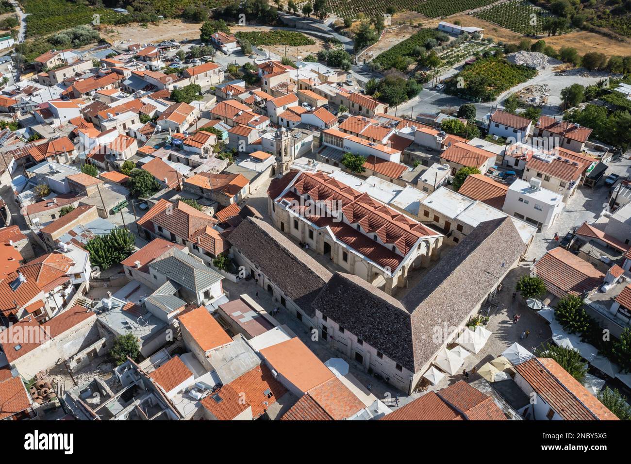 Aerial view of Omodos village with Monastery of the Holy Cross in ...