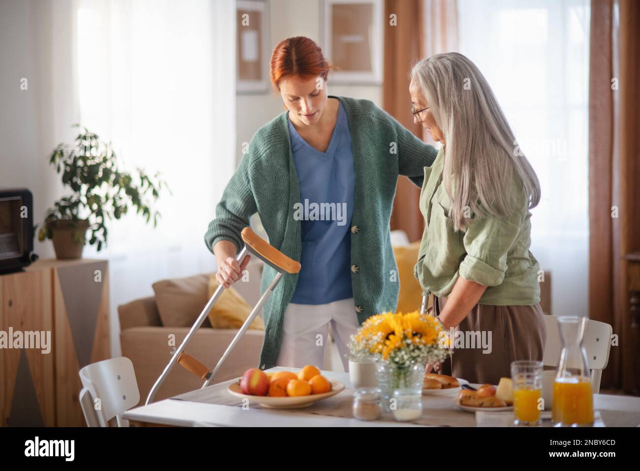 Helping leg injury support walking hi-res stock photography and images ...