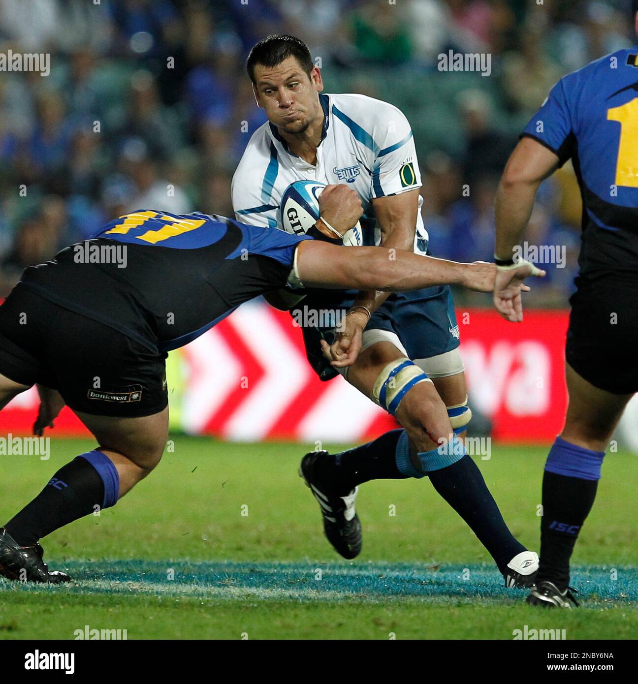 Bulls Johan Spies of South Africa is tackled by Kieran Longbottom of ...