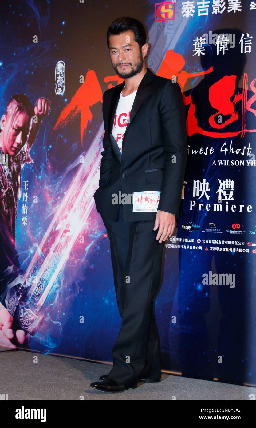 Hong Kong actor Louis Koo attends the movie premiere of his latest ...