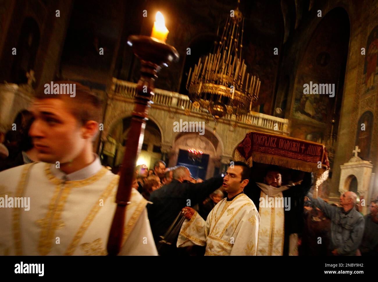 Bulgarian Orthodox priests carry a pall during a mass at Alexander ...