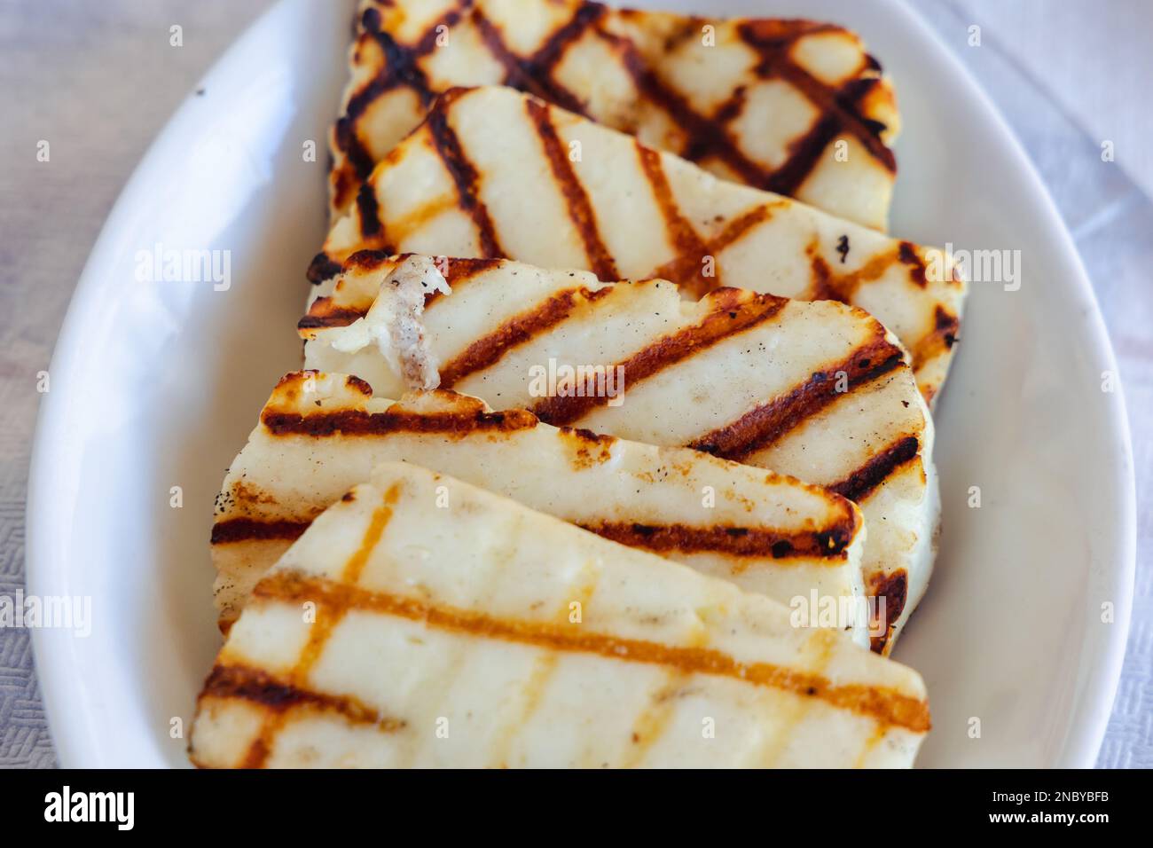 Grilled Halloumi - traditional Cypriot cheese on a plate in Cyprus ...