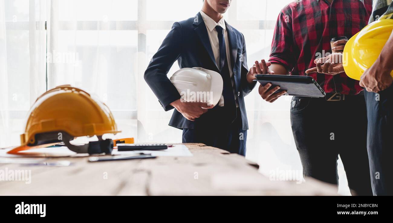 Group of professional engineering people brainstorming at meeting and ...