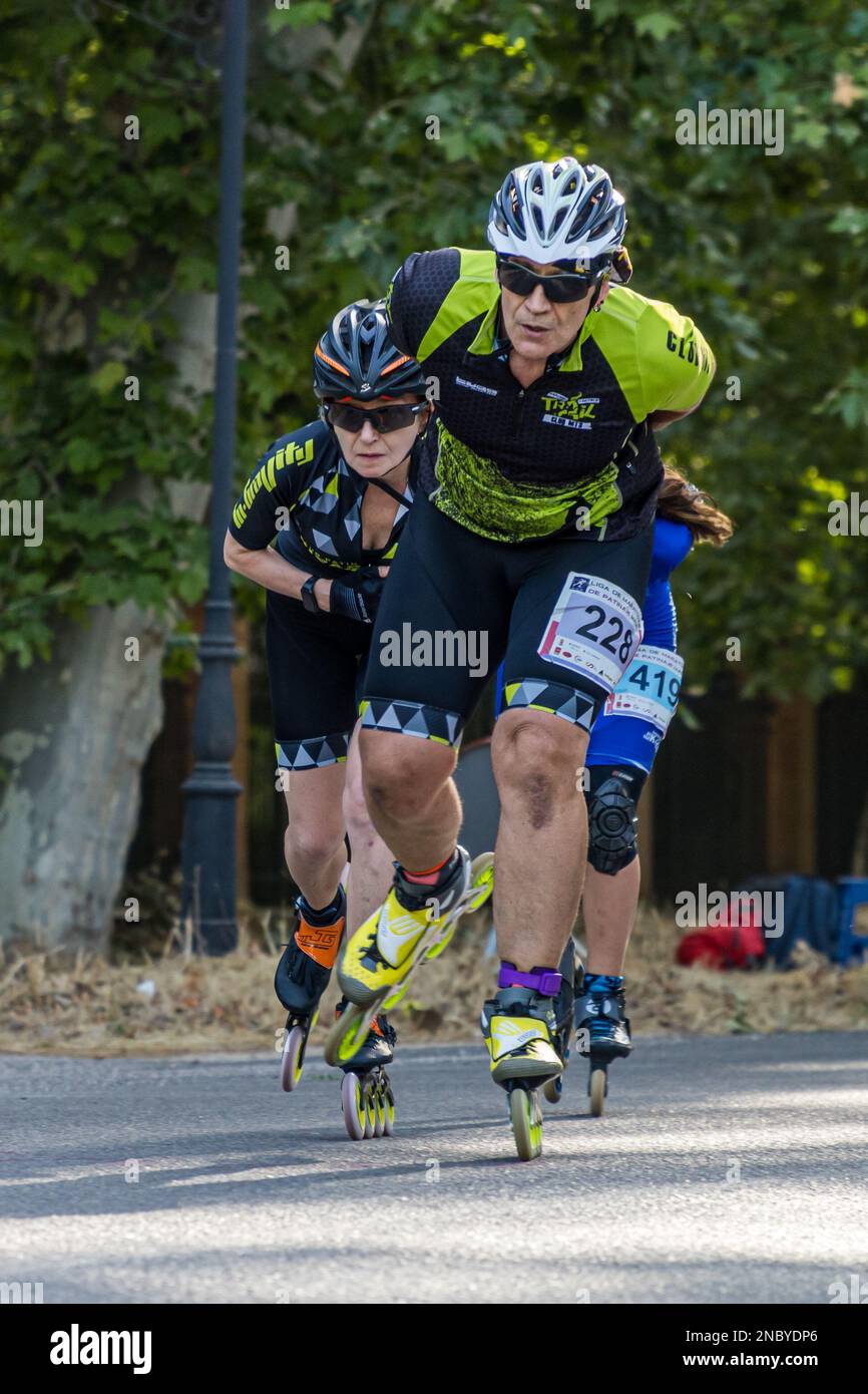 Vertical image of the marathon skating league held in the streets of ...