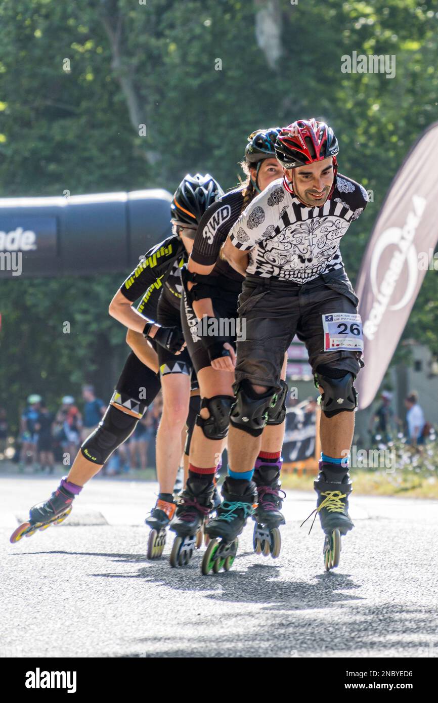 Vertical image of the marathon skating league held in the streets of ...